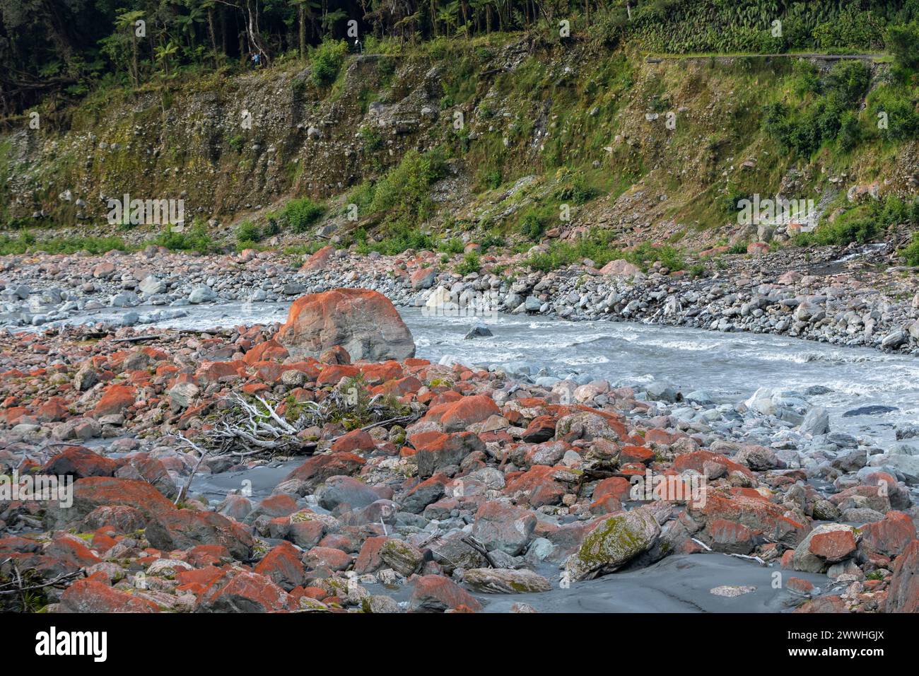 Rocks stained red by lichen are seen in the Fox river near the Fox ...