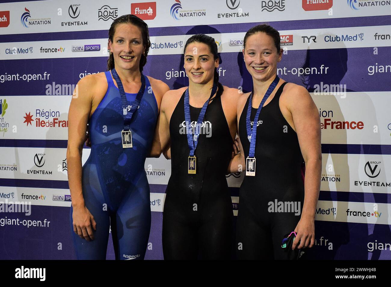 Paris, France. 23rd Mar, 2024. Switzerland's golden medalist Lisa Mamie (C) poses next to France ...