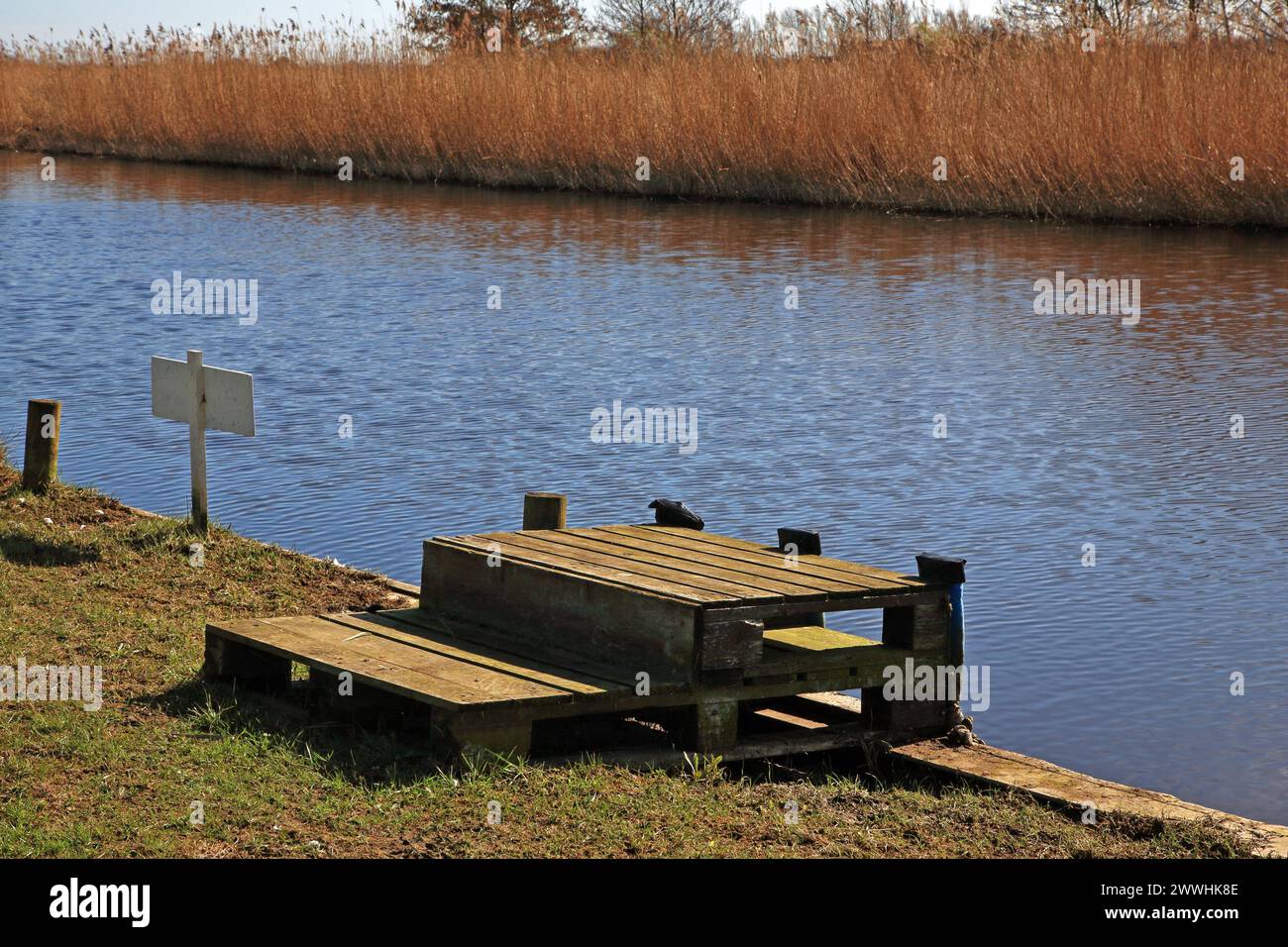 Quayside steps for boarding river craft at a mooring on the Norfolk ...