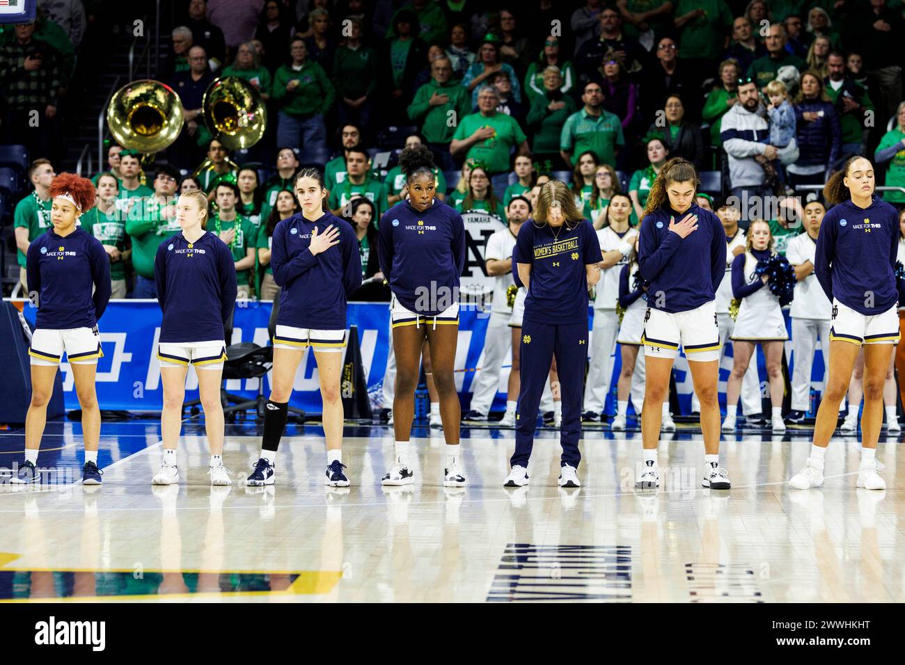 South Bend, Indiana, USA. 23rd Mar, 2024. Notre Dame players stand at attention during the ...