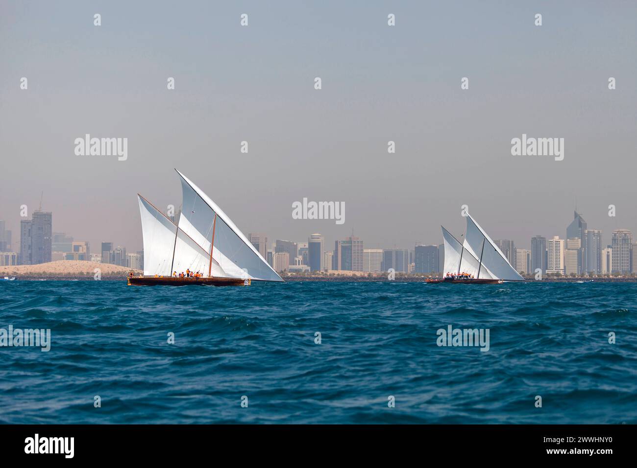 Traditional sailing dhows race back to Abu Dhabi at Ghanada Dhow ...