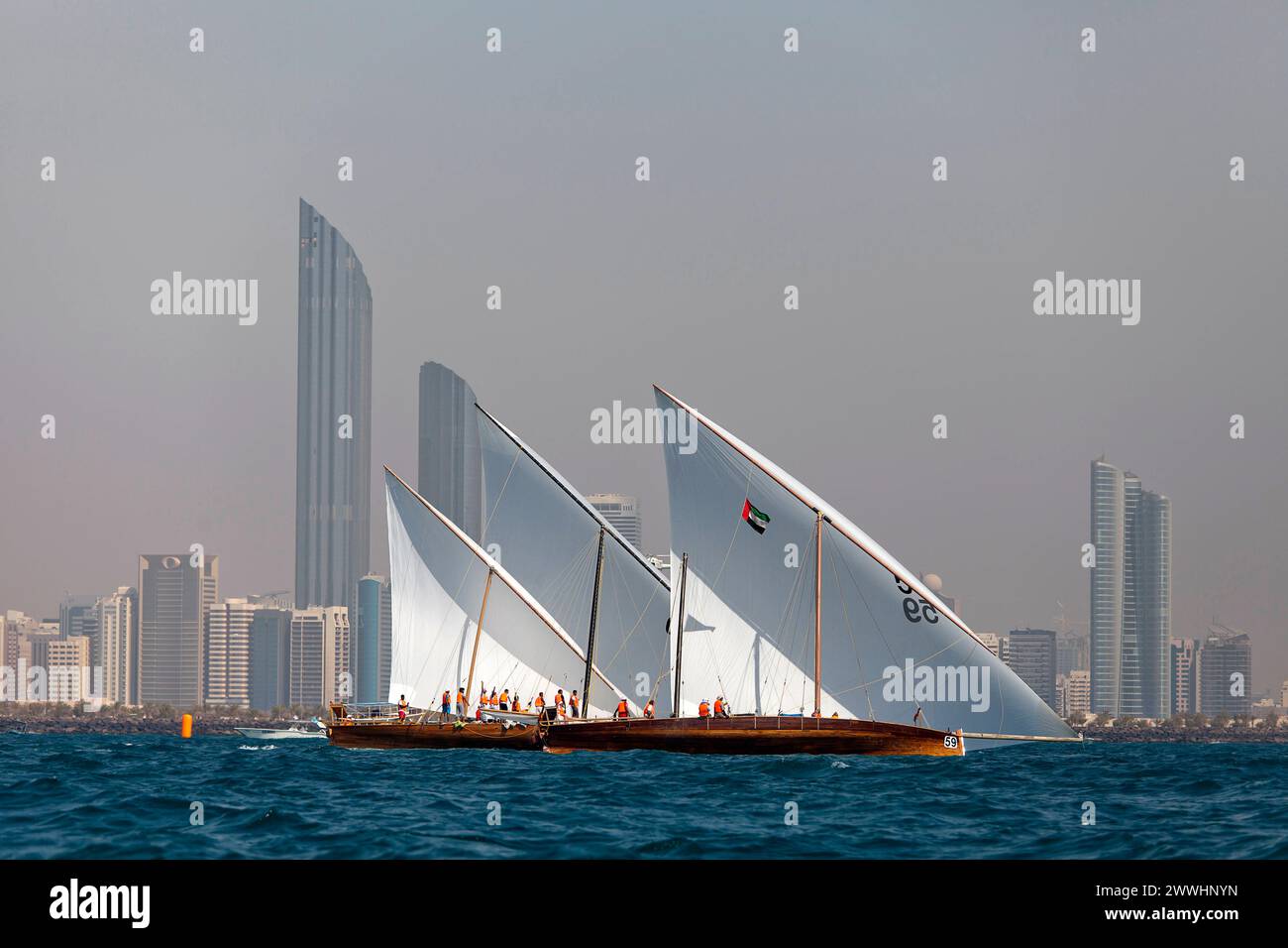 Traditional sailing dhows race back to Abu Dhabi at Ghanada Dhow ...