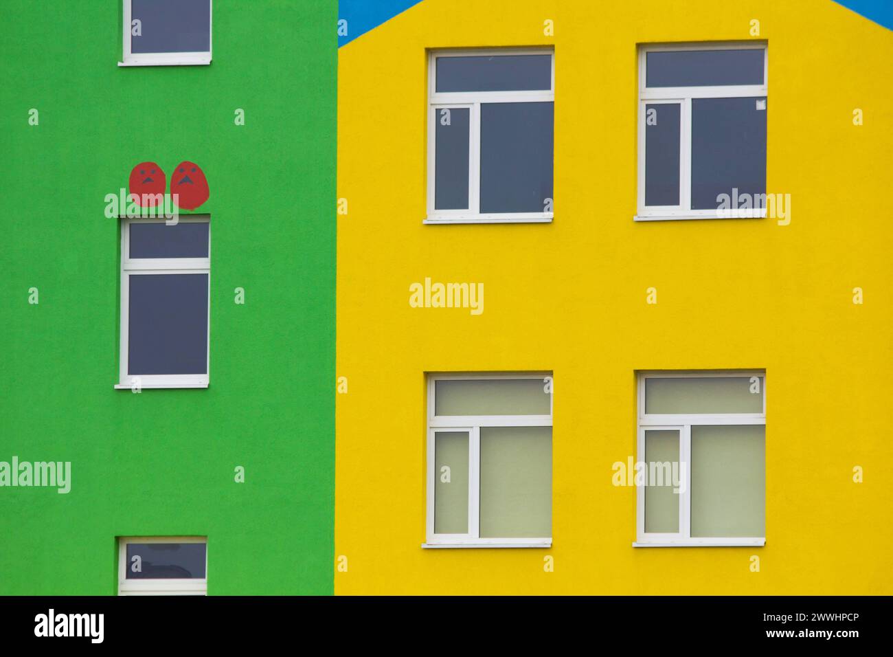Colored building. Kindergarten. Drawing on the building. Russia ...