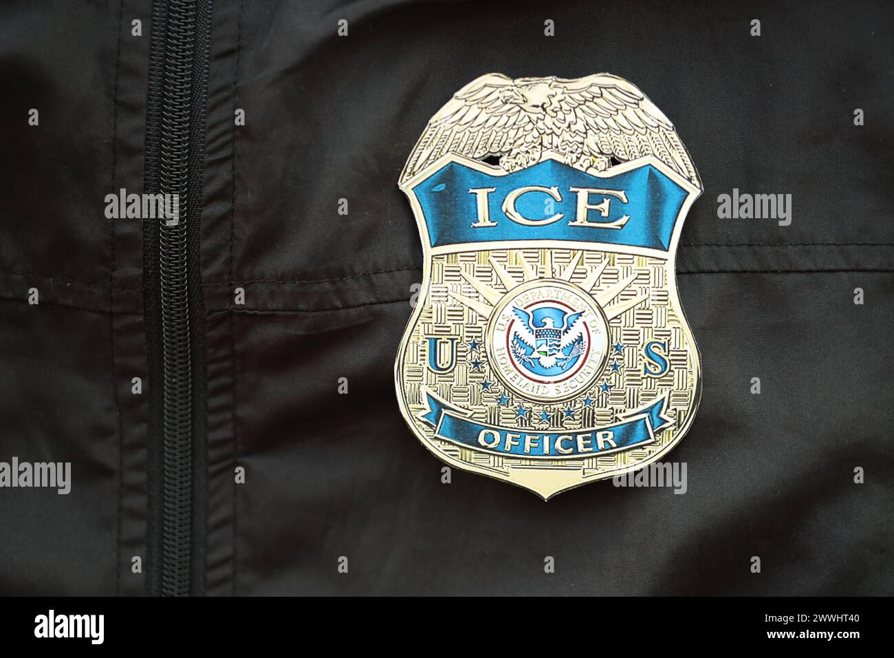 KYIV, UKRAINE - MARCH 9, 2024 US ICE Officer badge on black jacket ...