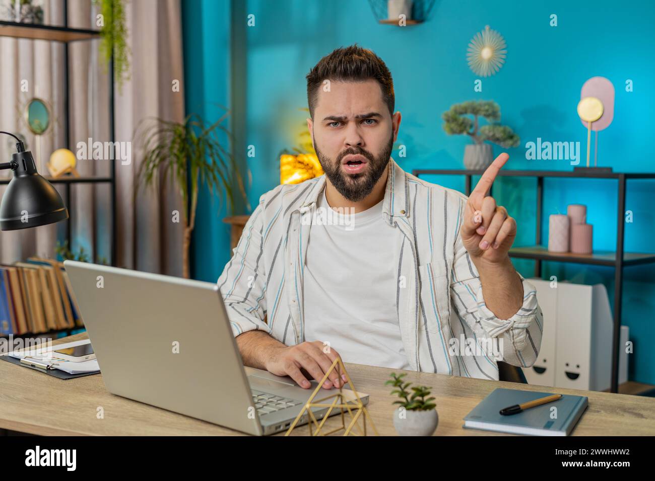 Dissatisfied man shaking head hi-res stock photography and images - Alamy