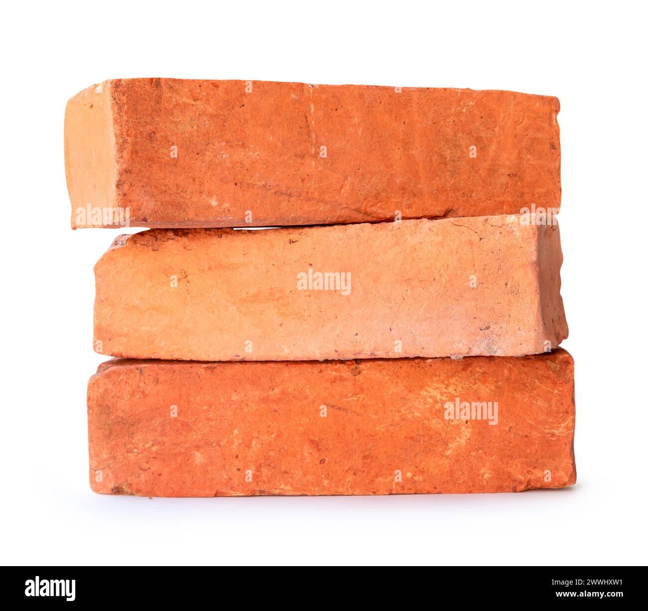 Side view of old cracked red or orange bricks in stack is isolated on ...