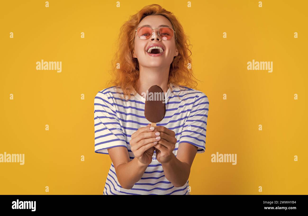laughing girl with icelolly ice cream in studio. girl with icelolly ice ...