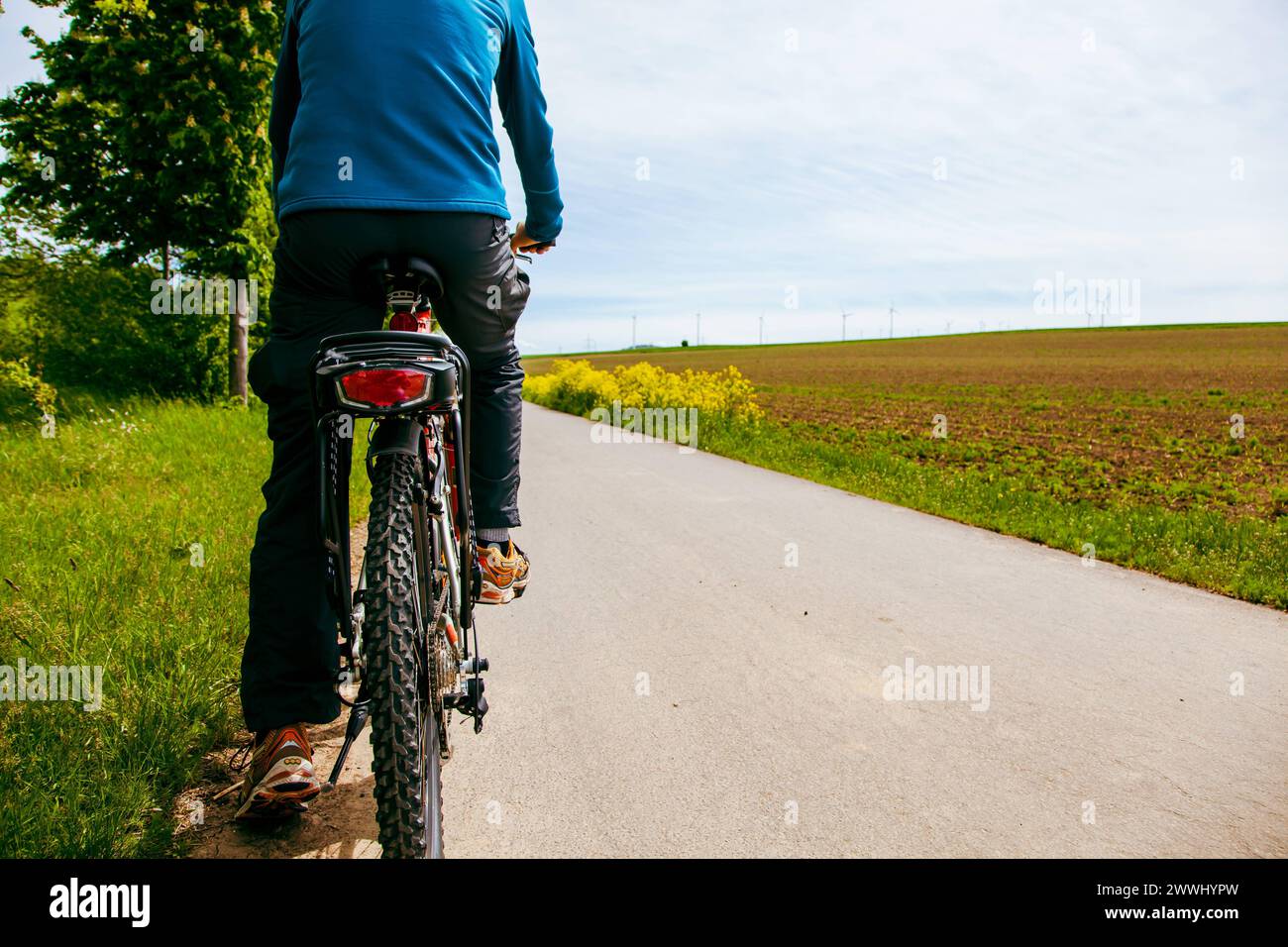 Male Person riding a bicycle. Cyclist riding mountain bike, on a ...