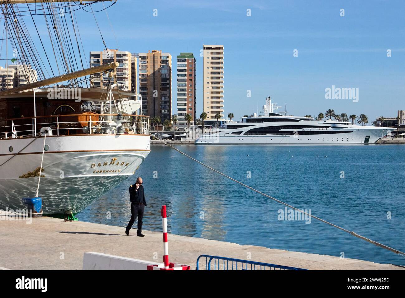 Pedestrian walkway alongside port Stock Photo - Alamy