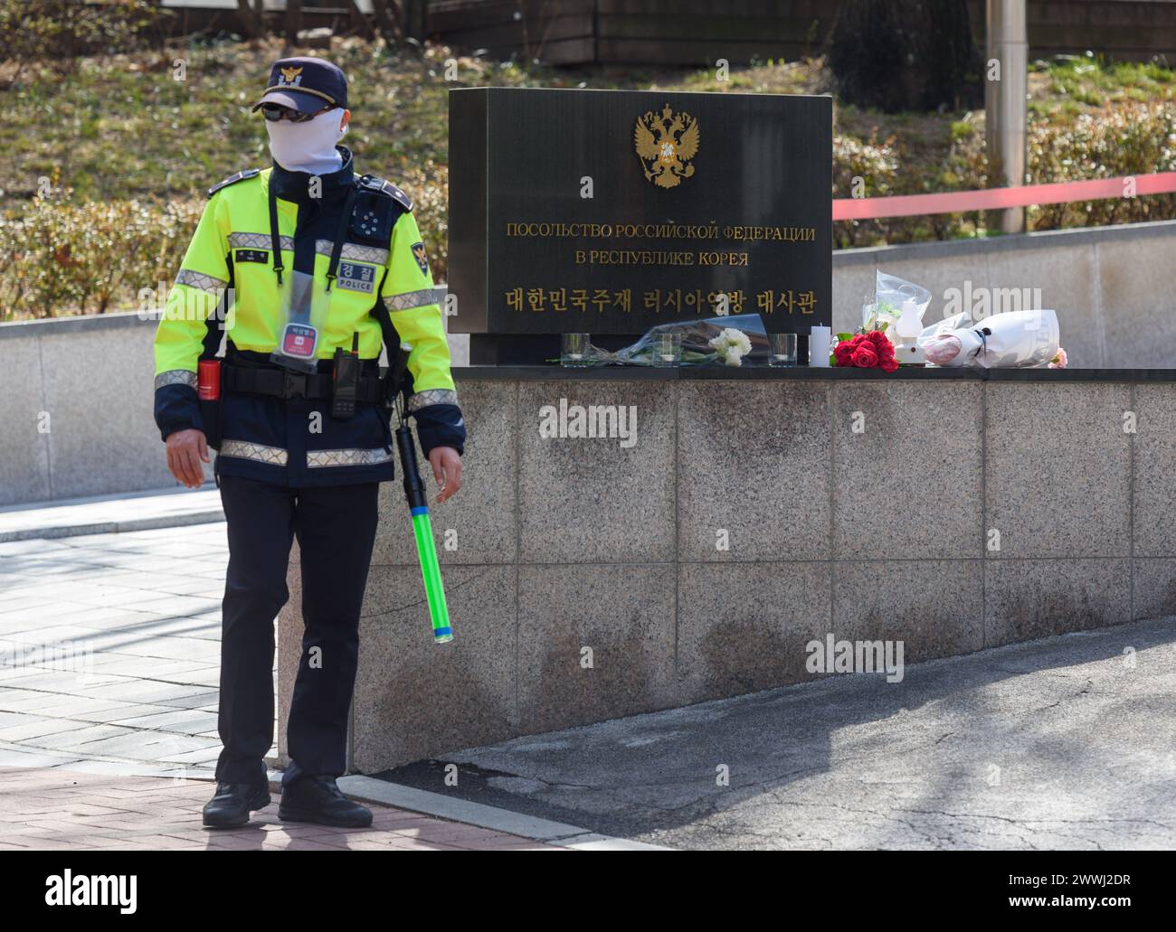 A South Korean police stands in front of the Russian Embassy in Seoul ...