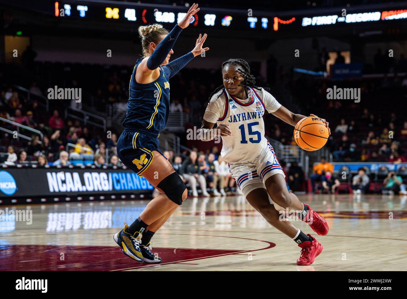 Kansas Jayhawks guard Zakiyah Franklin (15) drives against Michigan ...
