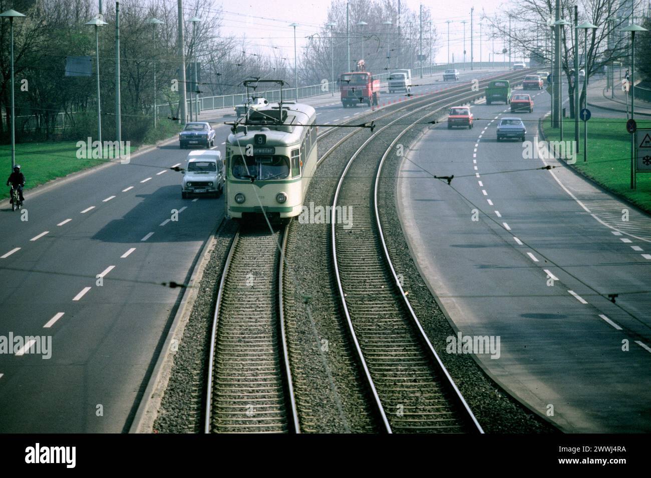 Tram on segregated tracks in centre of road in 1982, Cologne, North ...