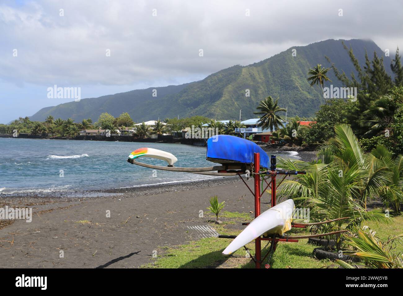 Black sand beach at Papara on the volcanic island of Tahiti in French ...