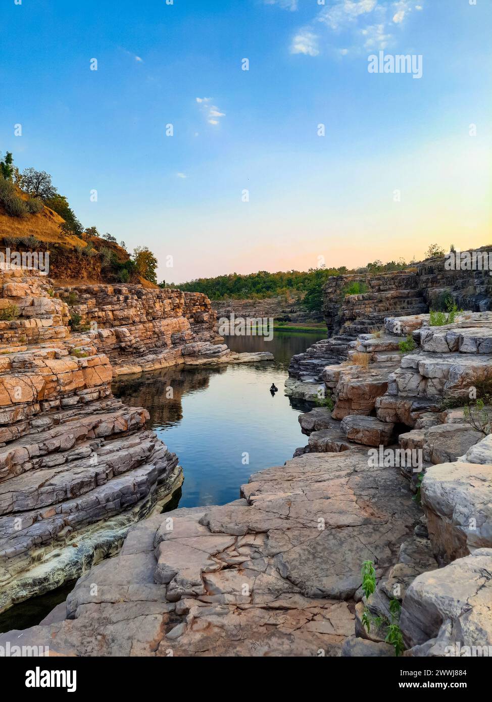 A beautiful lake surrounded by rocky mountain at Chidiya Bhadak, Indore ...