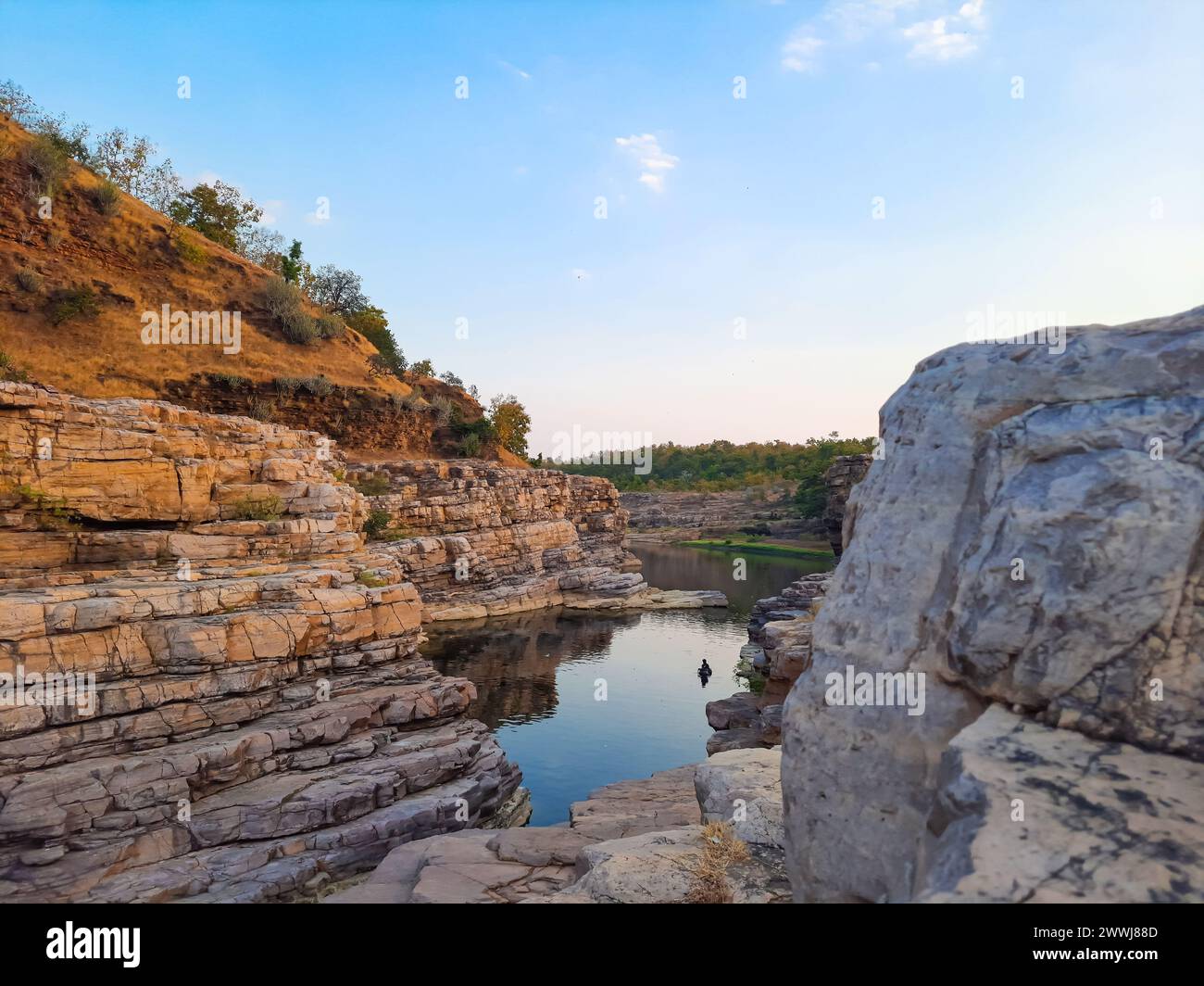 A beautiful lake surrounded by rocky mountain at Chidiya Bhadak, Indore ...