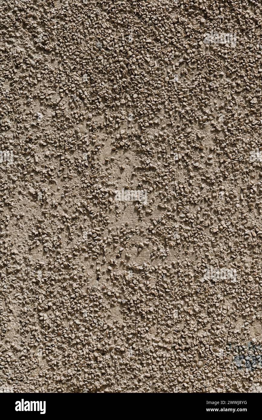 small gravel stucco wall finish texture and full-frame background Stock ...