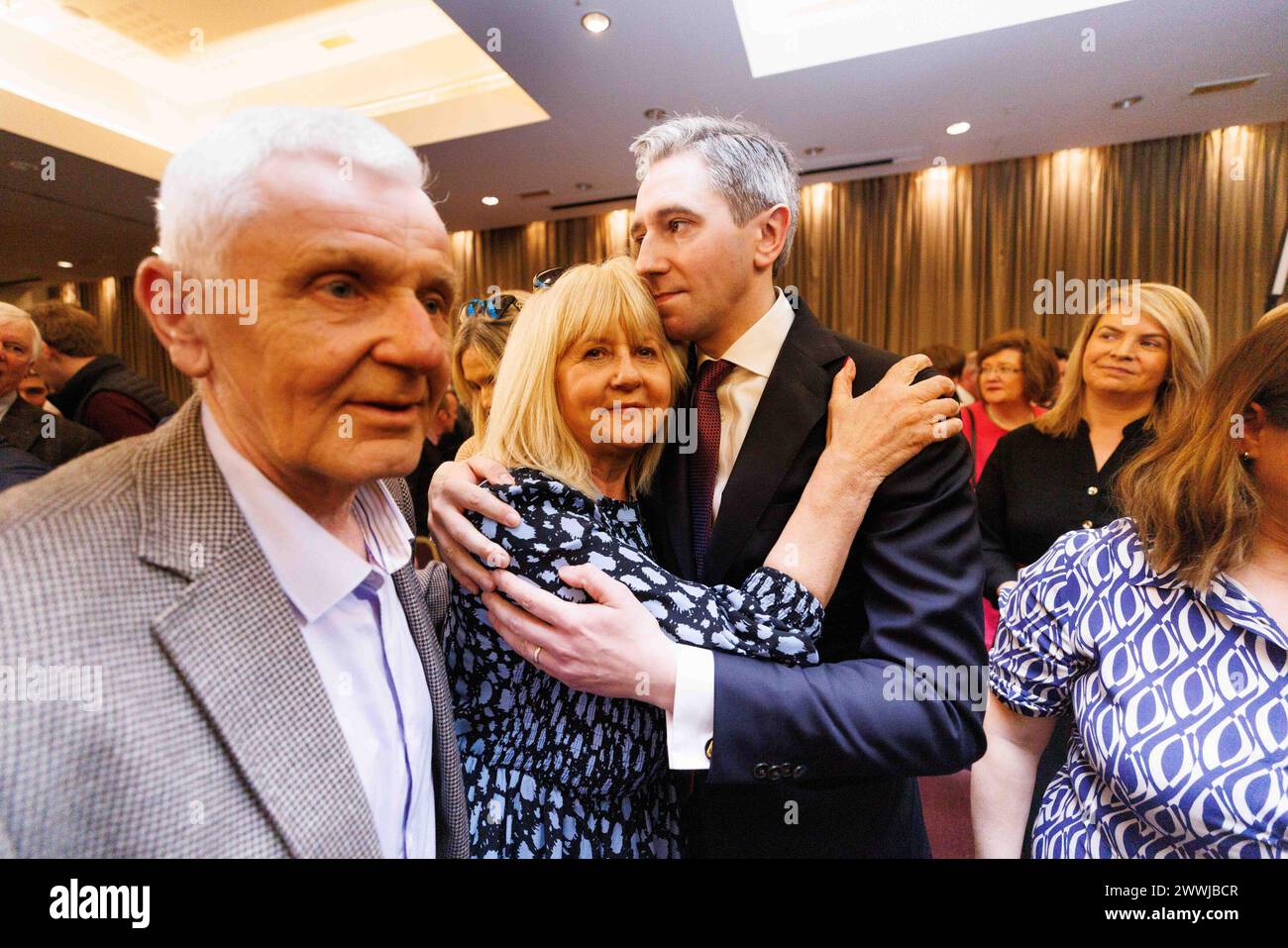 Simon Harris with his parents Mary and Bart, after he was confirmed as ...