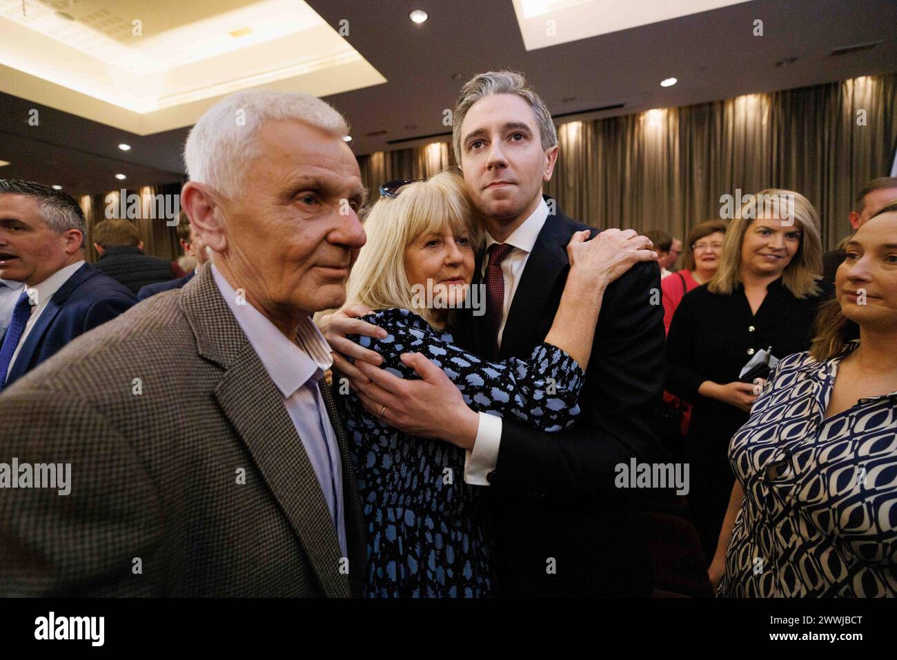 Simon Harris with his parents Mary and Bart, after he was confirmed as ...