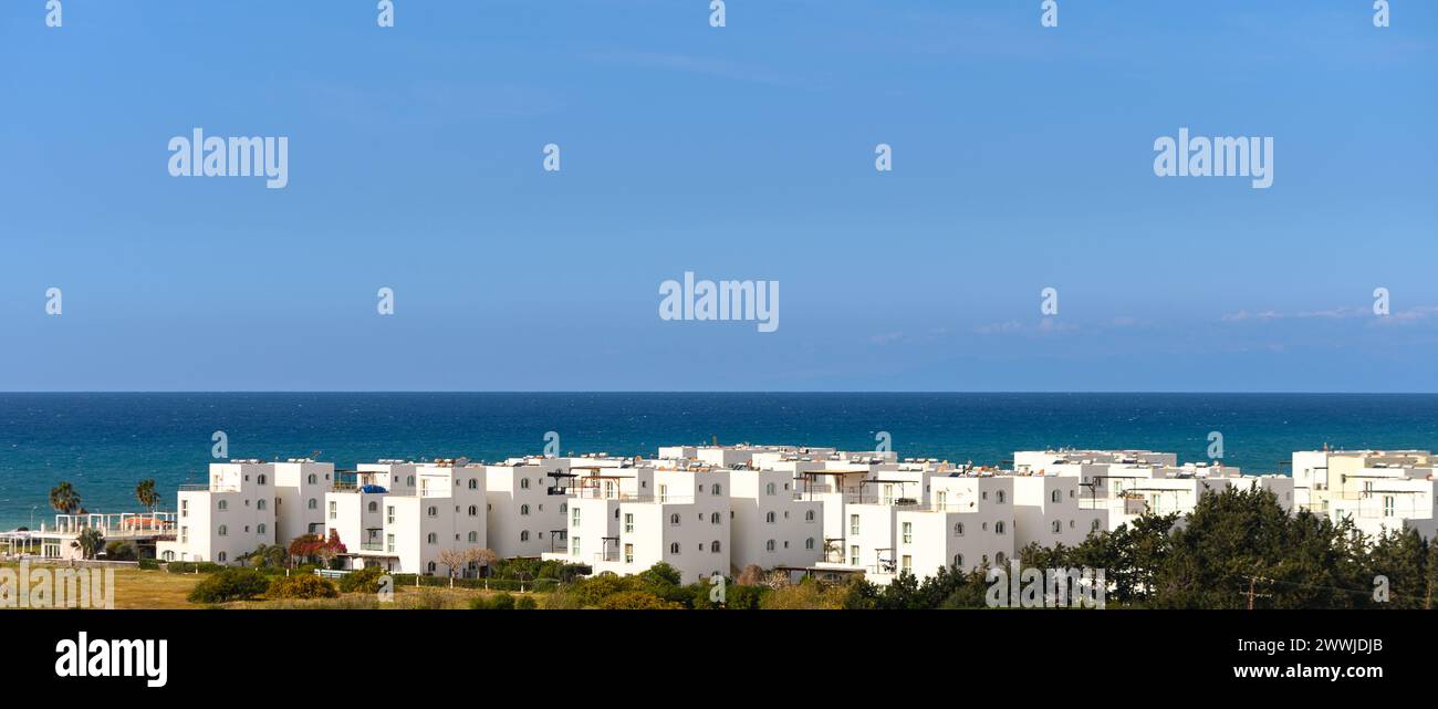 residential complex with white villas traditional for the Mediterranean ...