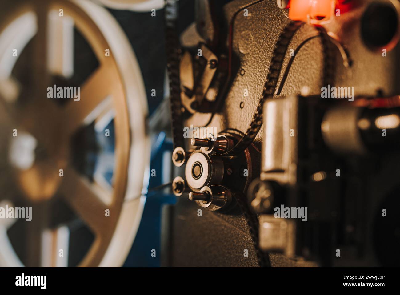 Vintage 8mm film projector, rotating reels. Nostalgic charm of classic ...