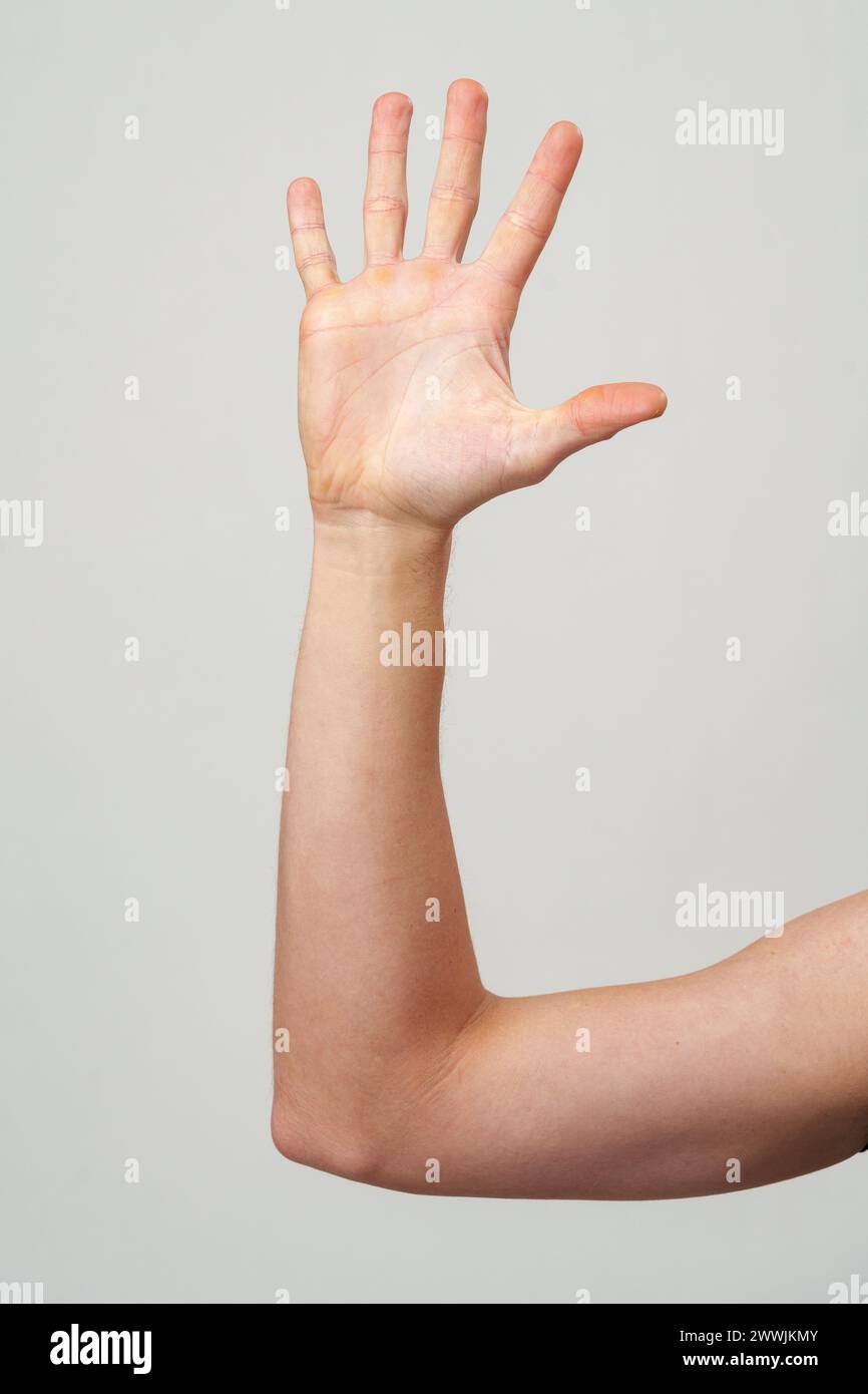 Five fingers together hand gesture hi-res stock photography and images ...