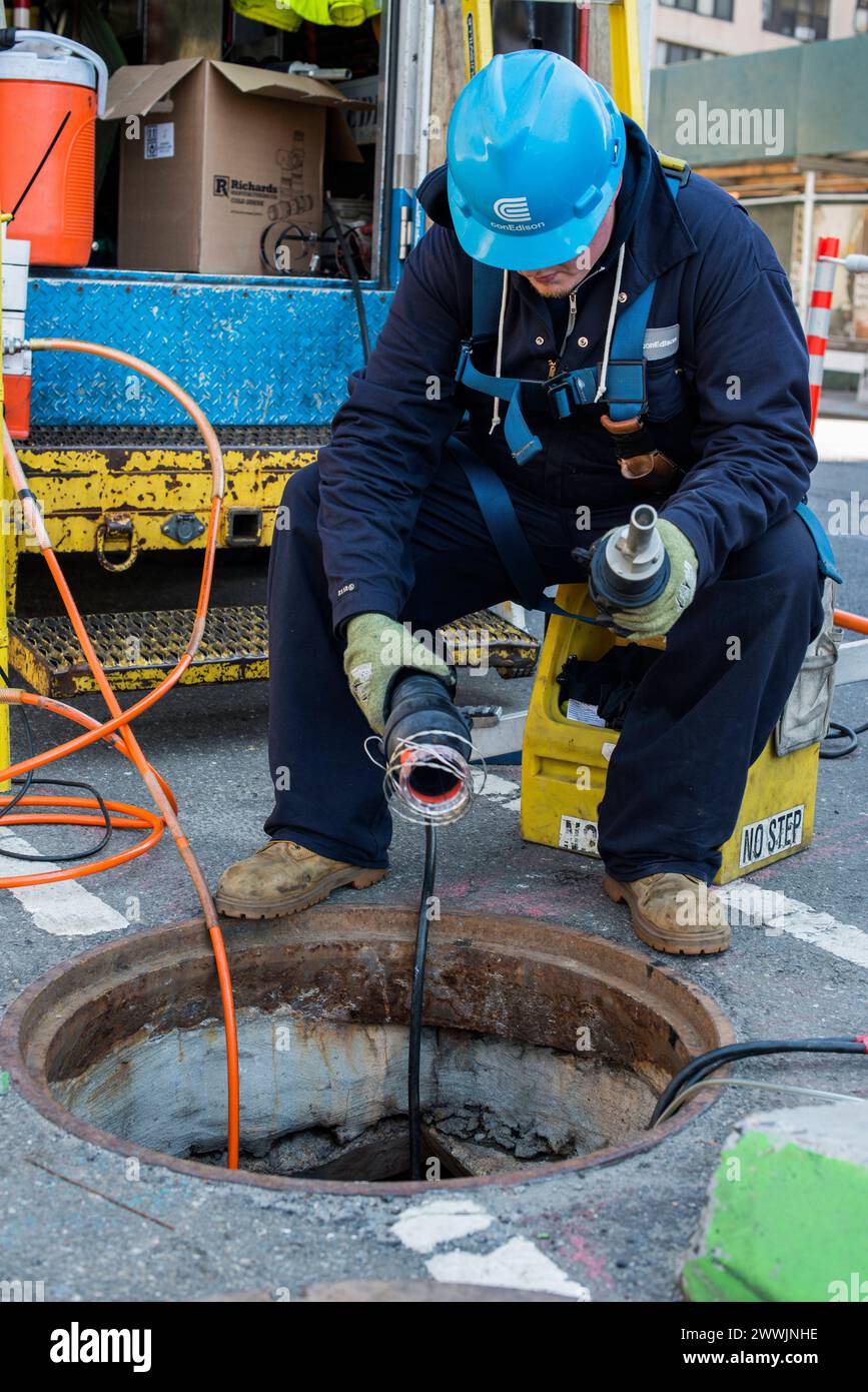 Constructionworker with manhole New York City, USA. Caucasian ...