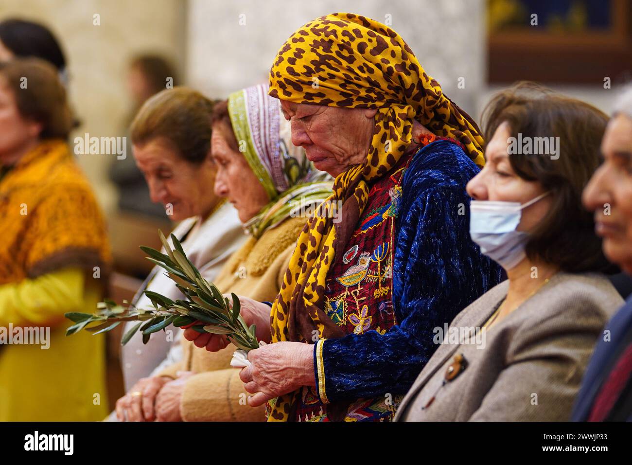 Al Hamdaniya, Iraq. 24th Mar, 2024. Iraqi Christians attend Palm Sunday ...