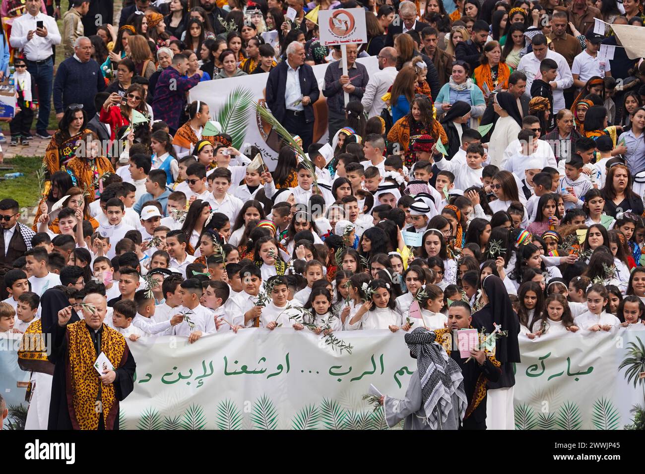Al Hamdaniya, Iraq. 24th Mar, 2024. Iraqi Christians participate in the ...