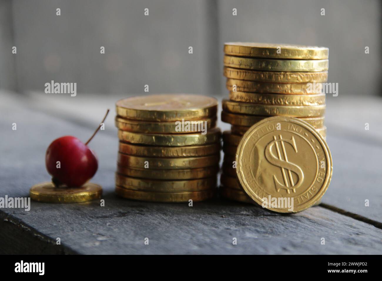 Business success. Raising chart with golden coins money Stock Photo - Alamy