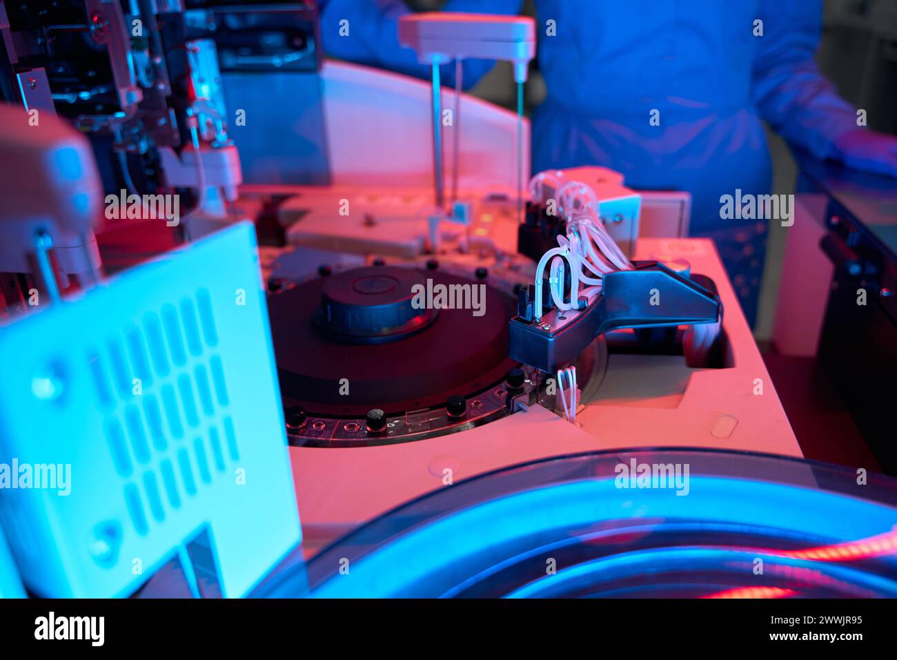 Specialist uses a device for automatic isolation of nucleic acids Stock ...
