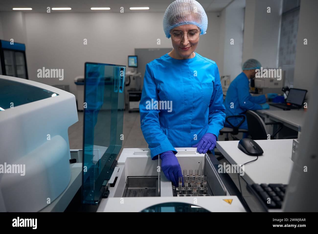 Laboratory assistant works with blood samples in the laboratory Stock ...
