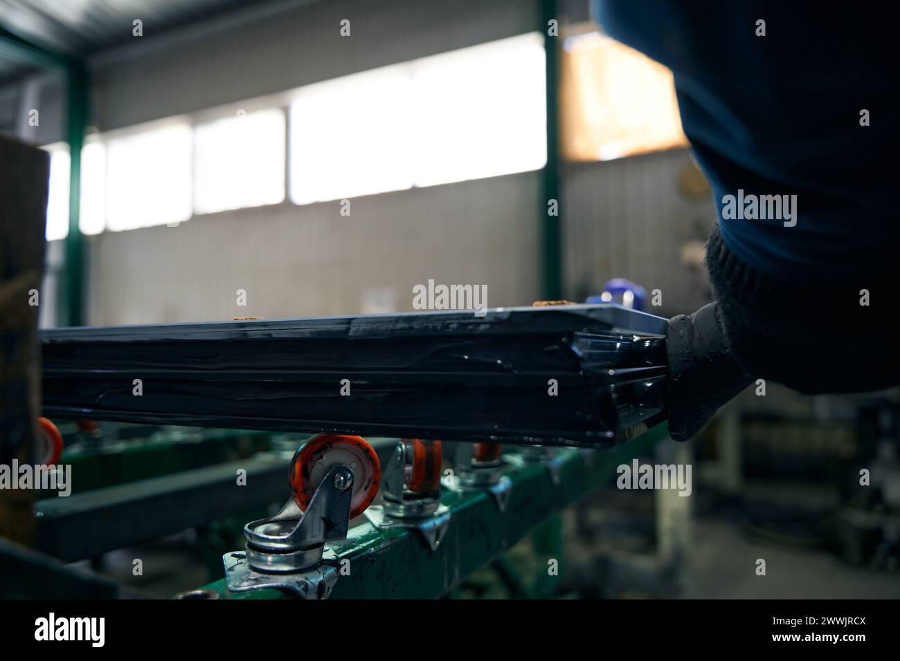 Special processing of double-glazed windows in window production Stock ...