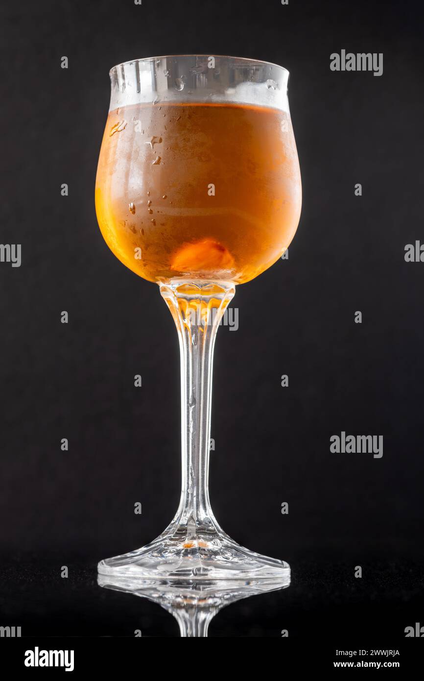 Glass of Waterloo cocktail on the black background Stock Photo - Alamy