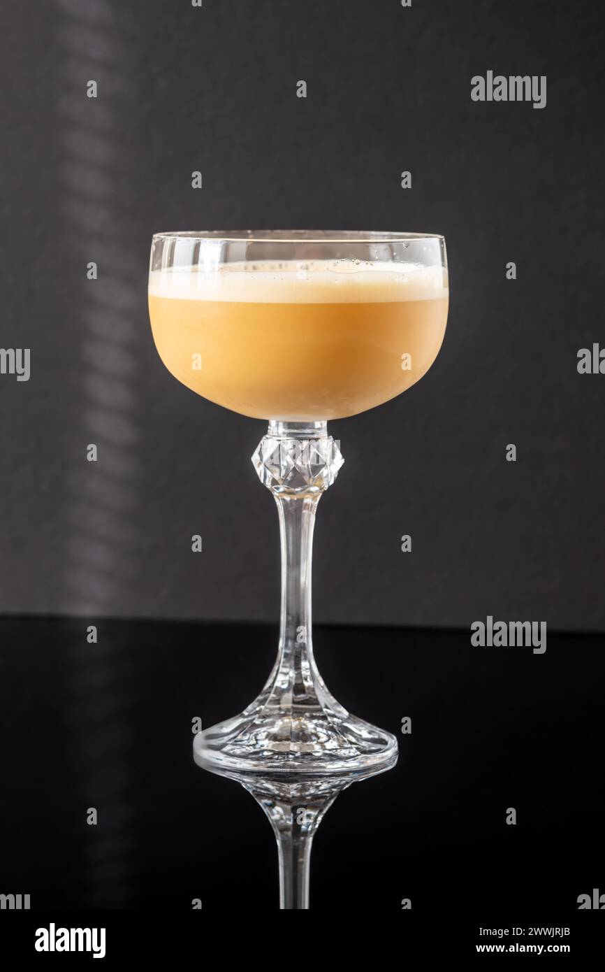 Death Flip cocktail garnished with grated nutmeg Stock Photo - Alamy