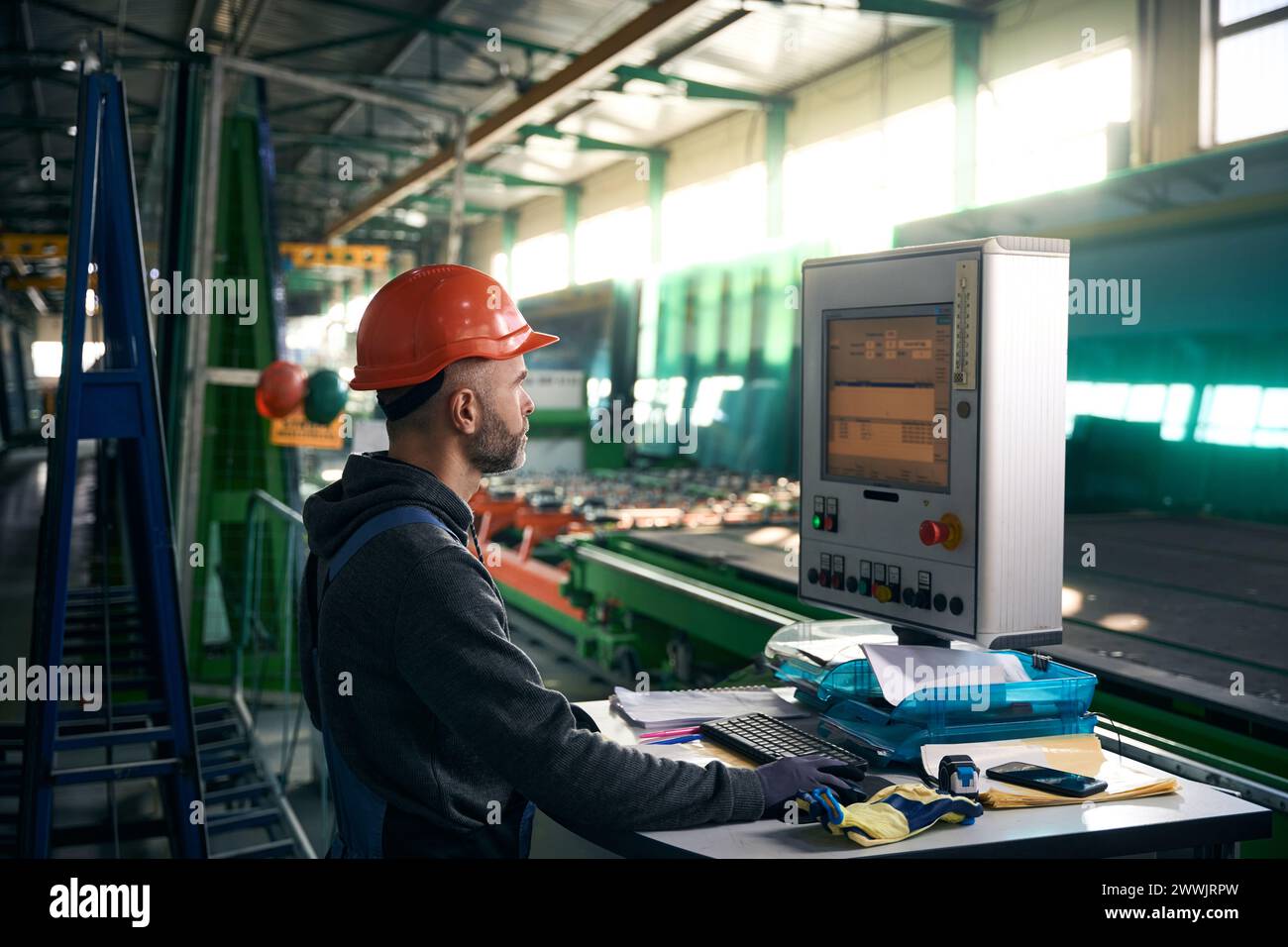 Master uses high-tech equipment to produce double-glazed windows Stock ...