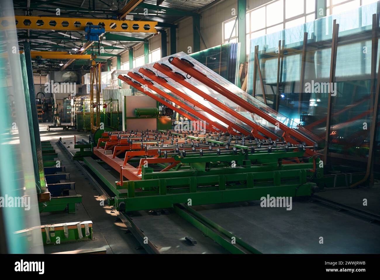 Mechanical table cutter in the production workshop Stock Photo - Alamy