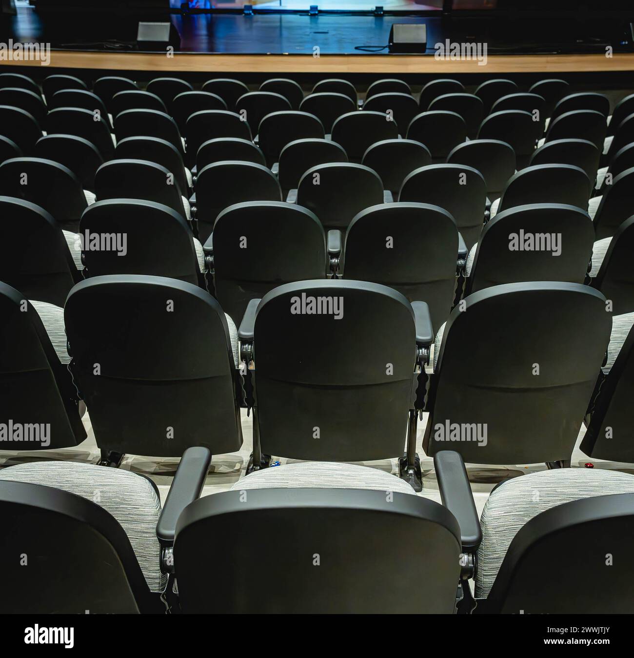 Vacant seats in auditorium under stage spotlight Stock Photo - Alamy Vacant seats in auditorium under stage spotlight Stock Photo - Alamy