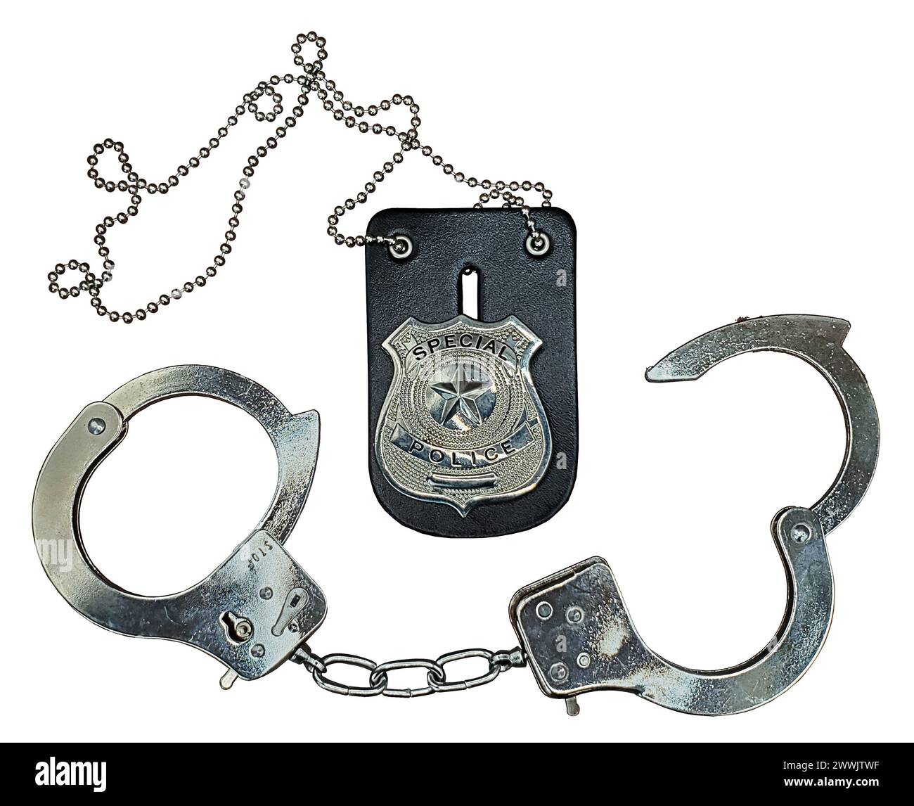 Police badge on a badge hanger with metal handcuffs Stock Photo - Alamy