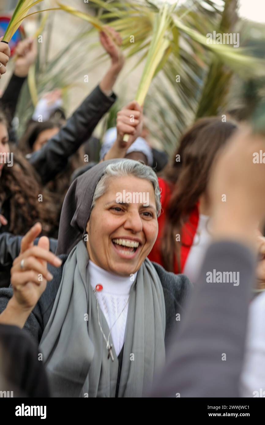 Jerusalem, Israel. 24th Mars, 2024. A nun is dancing and smiling at the ...