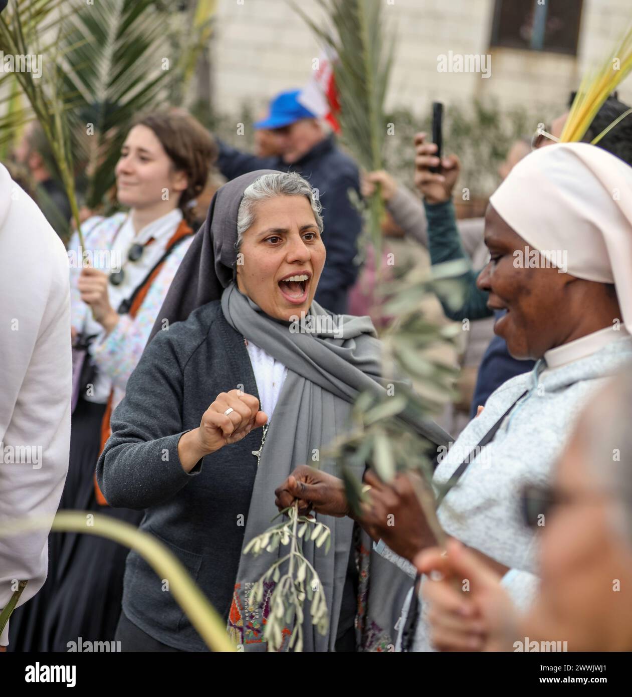 Jerusalem, Israel. 24th Mars, 2024. A nun is dancing and singing at the ...