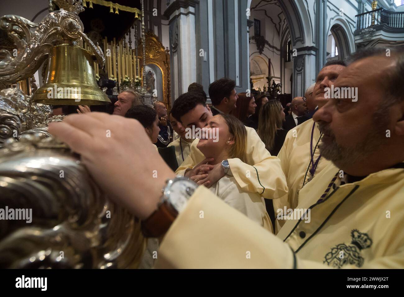 A penitent is seen crying inside a church after the procession of the ...