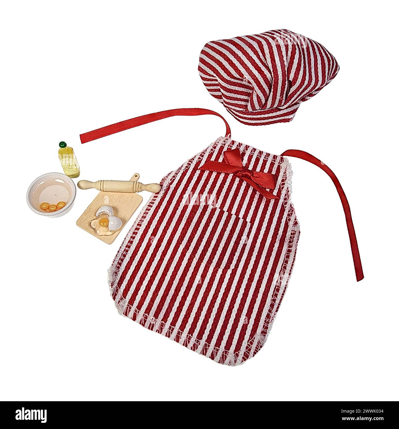 Red and white striped chef hat and apron with kitchen utensils Stock ...