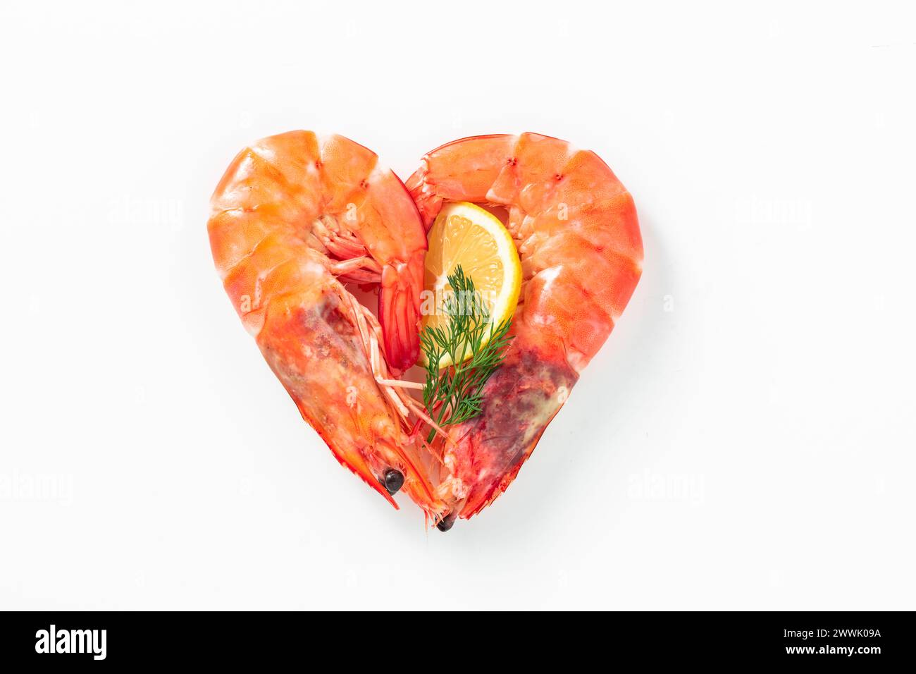 heart shape with Precooked tiger prawns on white Stock Photo - Alamy
