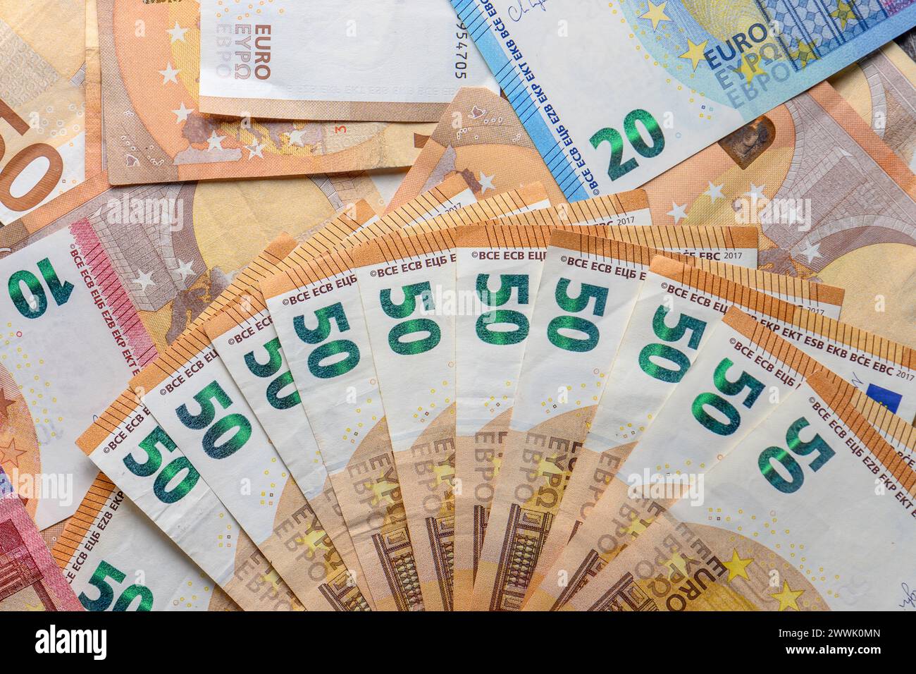 Euro 50 banknotes fanned out on a background of paper bills 4 Stock ...