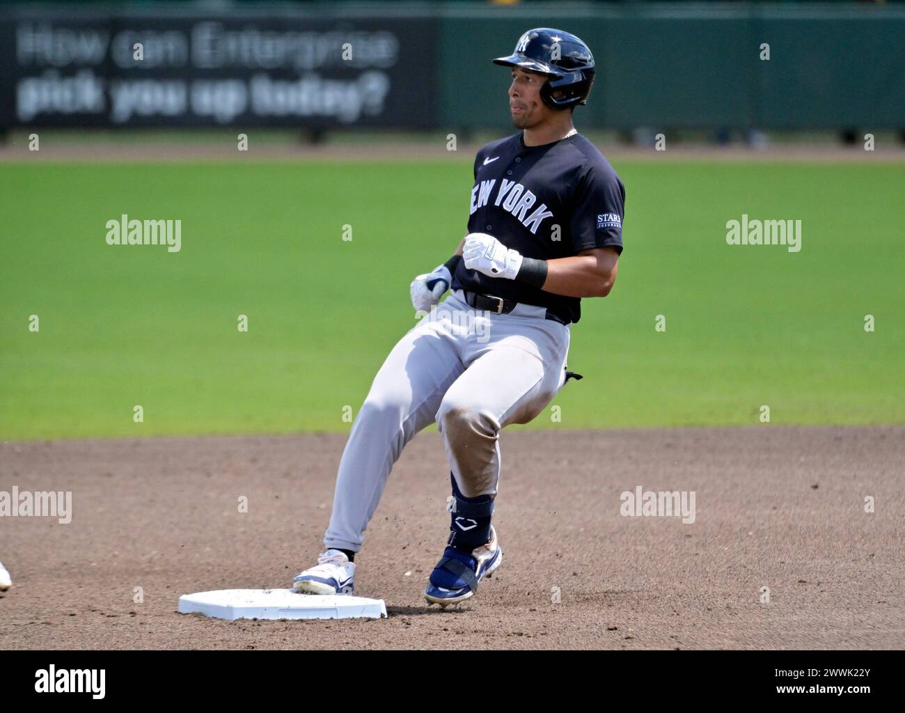 New York Yankees' Jahmai Jones holds up at second base after hitting a ...