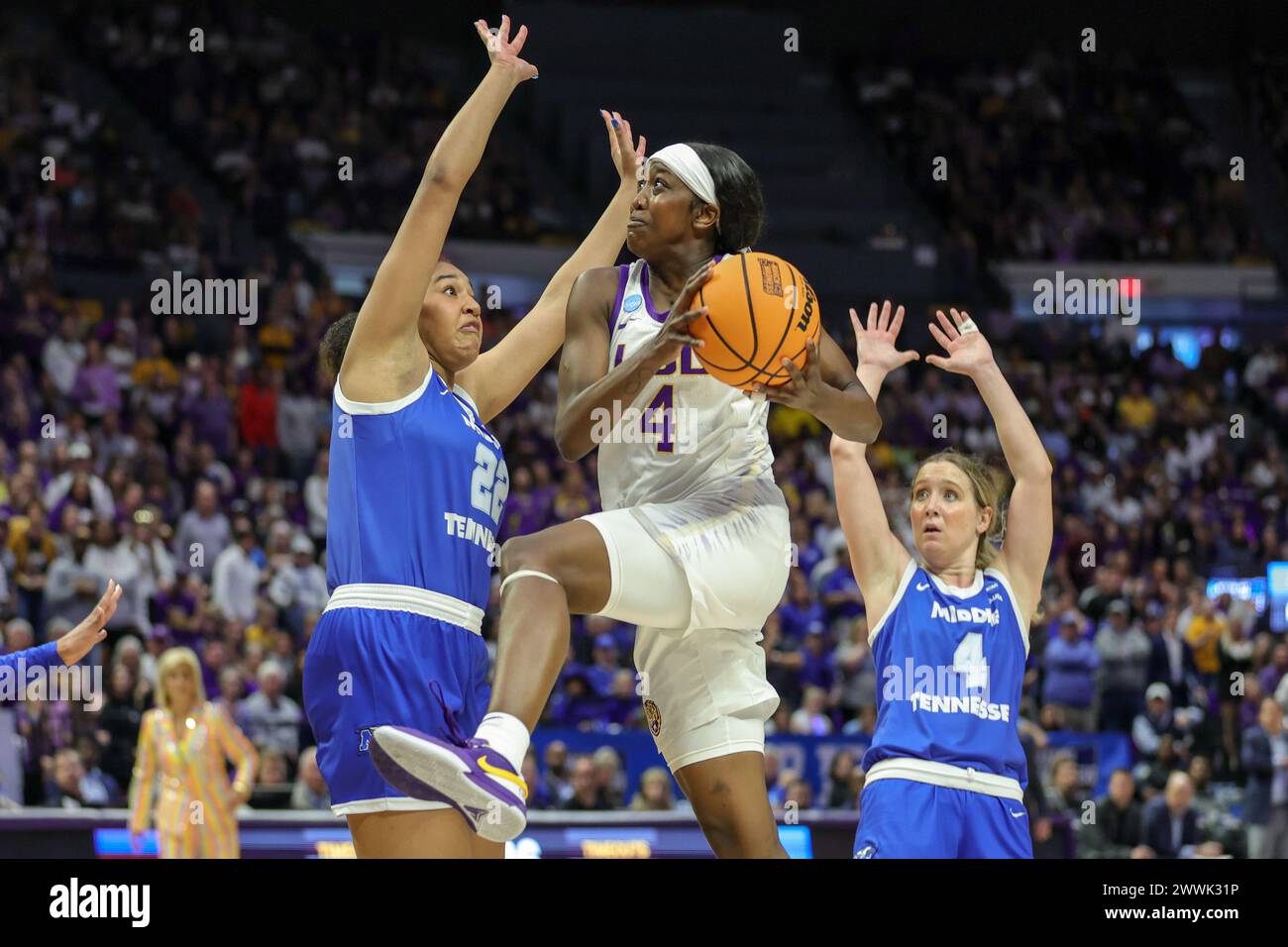 Baton Rouge, LA, USA. 24th Mar, 2024. LSU's Flau'jae Johnson (4) drive ...