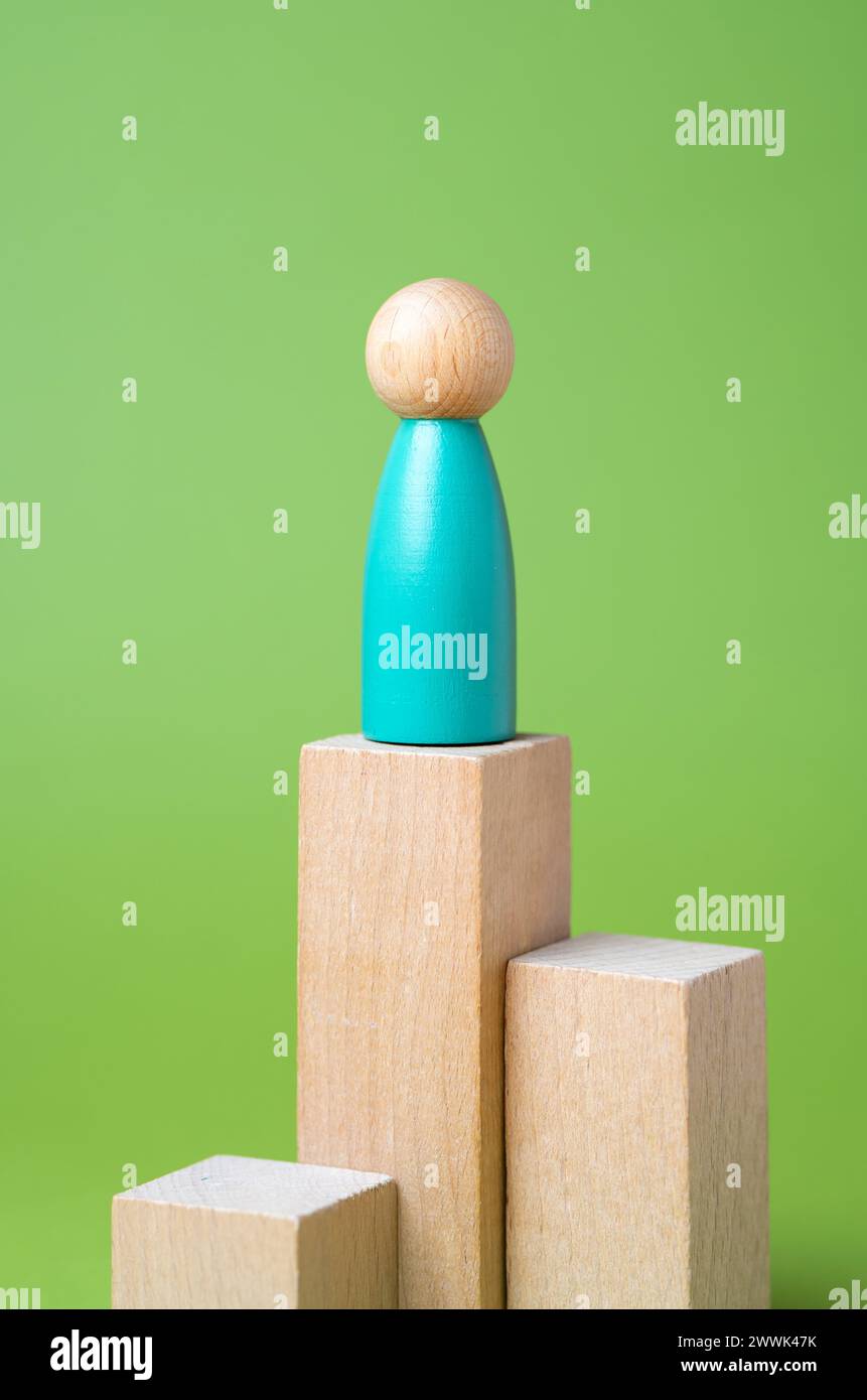 Reach the top. Man on a pedestal. Reach heights. Career success ...