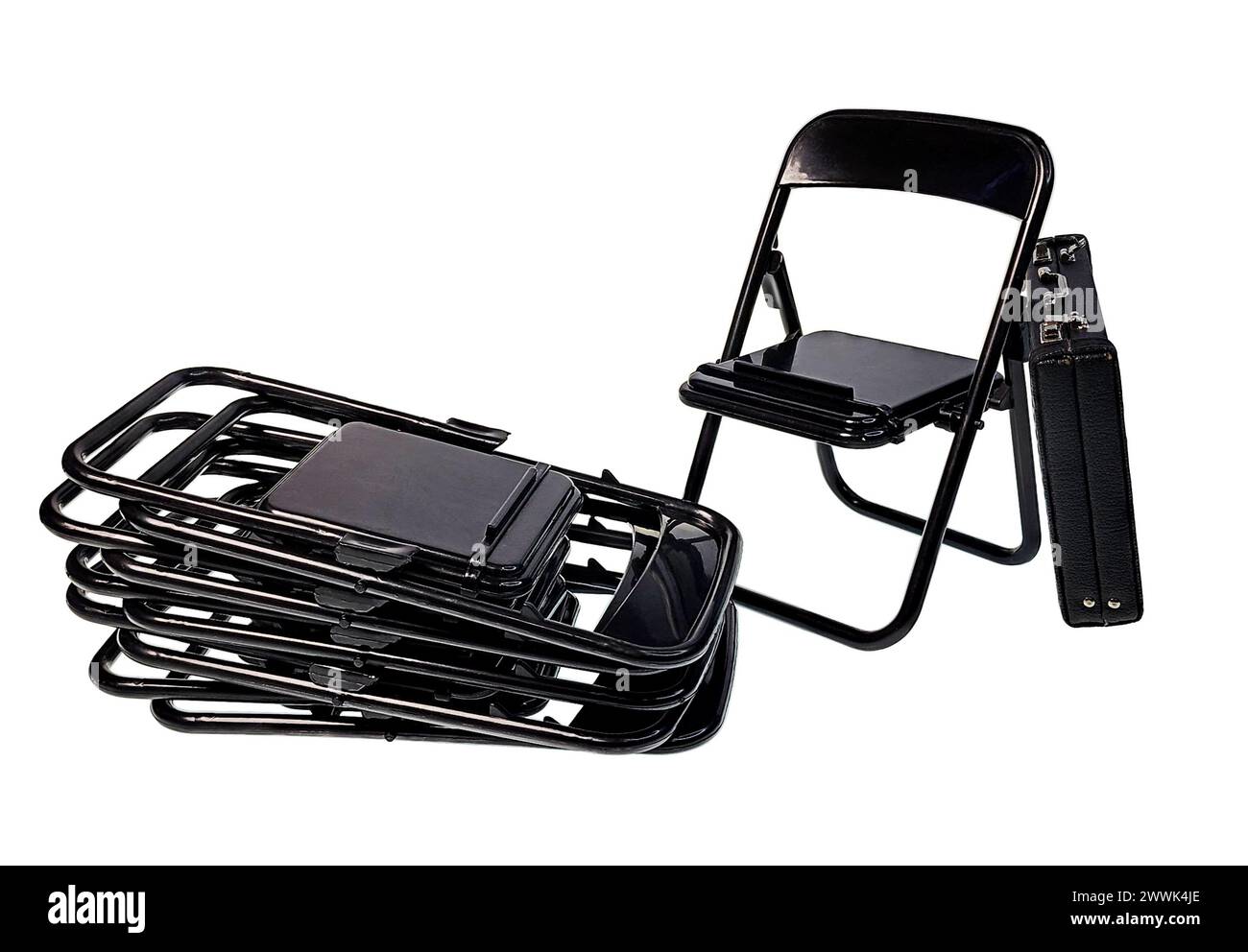 A set of Black Folding chairs for easy seating for groups and briefcase ...