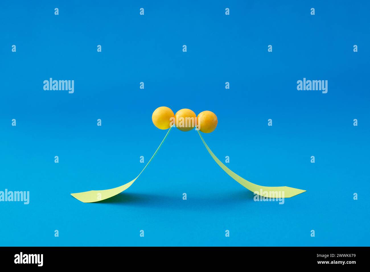 Balance with teamwork to achieve a goal Stock Photo - Alamy