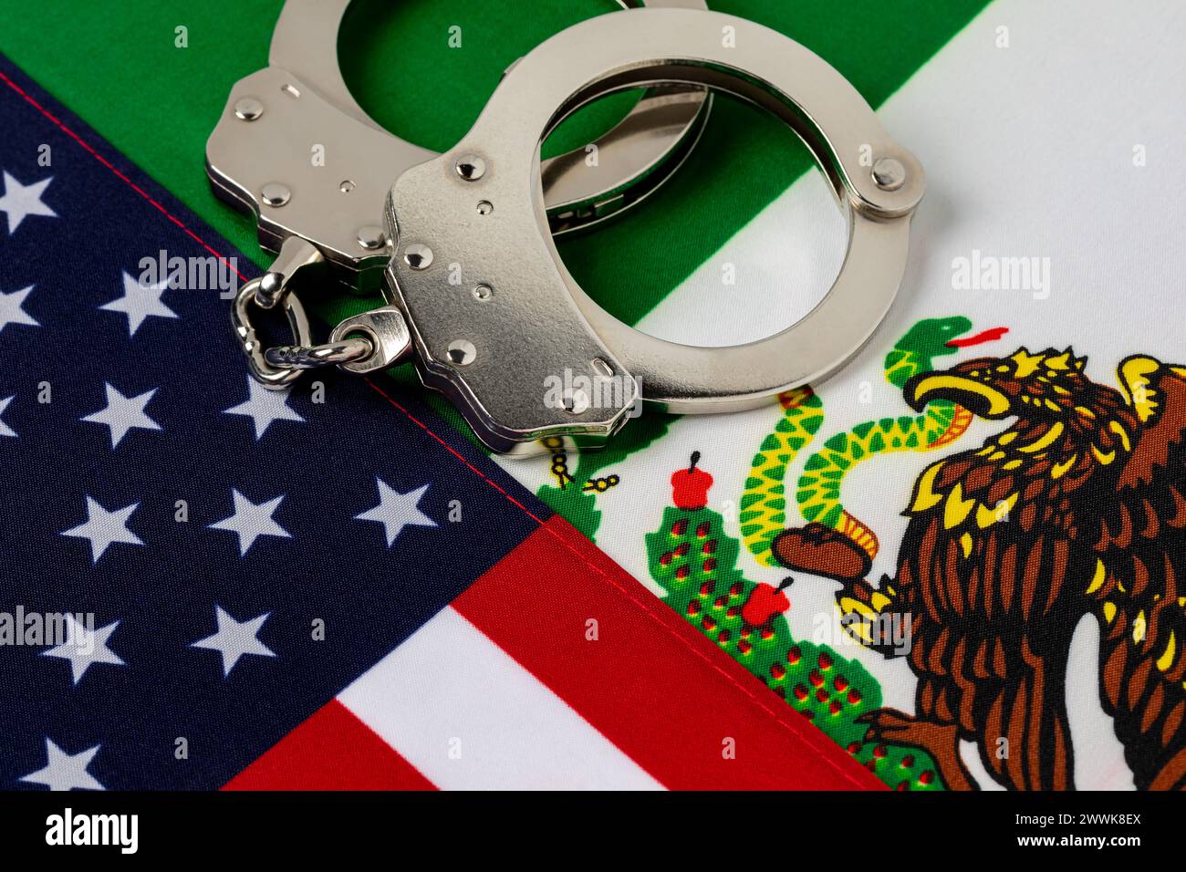 United States and Mexico flags with handcuffs. Border security ...